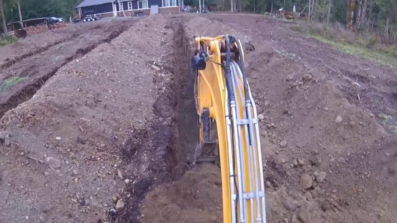 Geothermal dig for trench #3 - YouTube