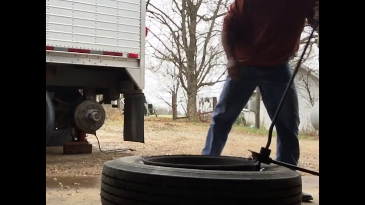 Dismounting 11R-24.5 semi trailer tires with our E-Z Way truck tire ...