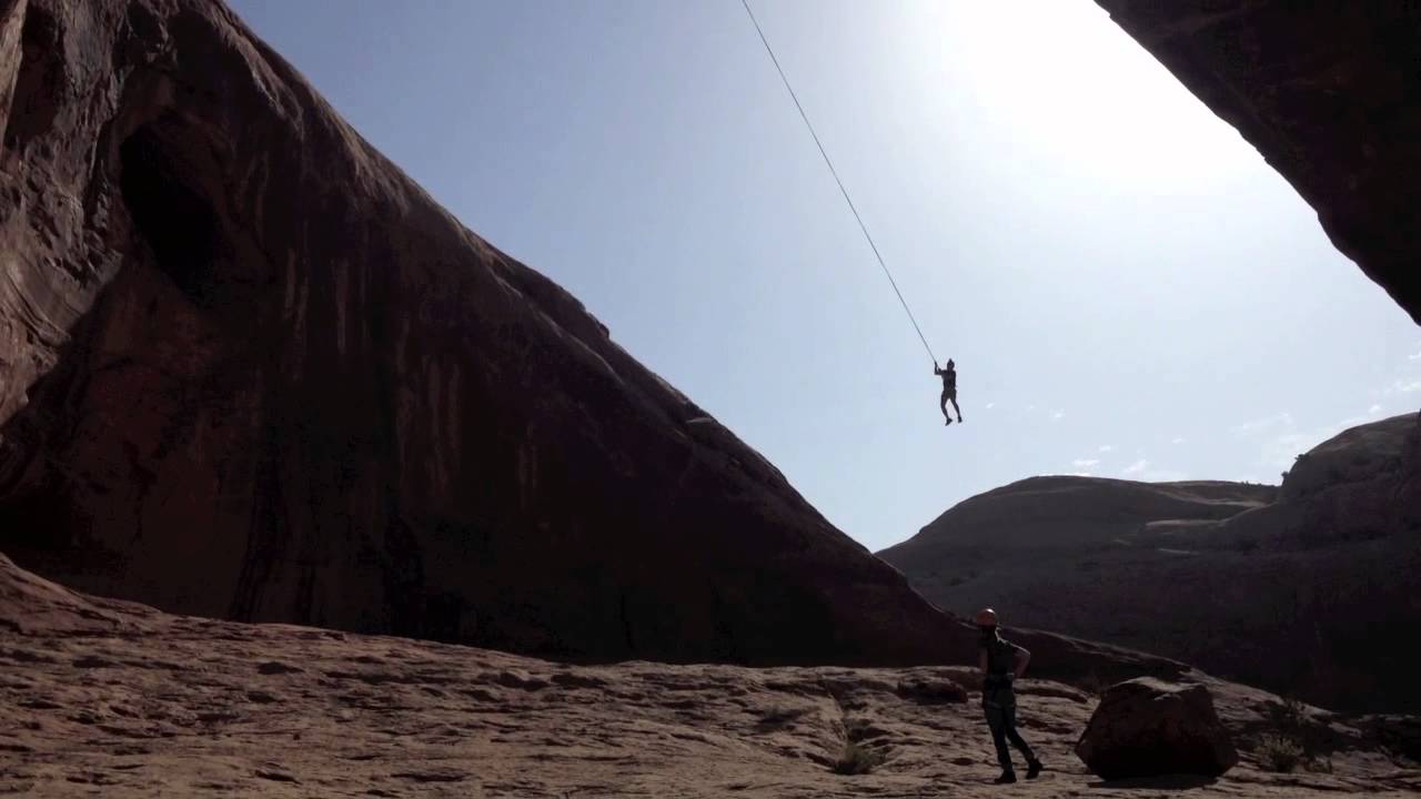Moab Corona Arch Jump Swing (50 Kings): Ben's jump, seen from the base ...
