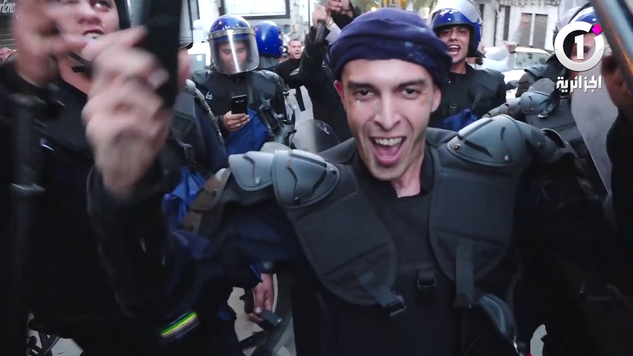 Algerian police and people together in street - YouTube