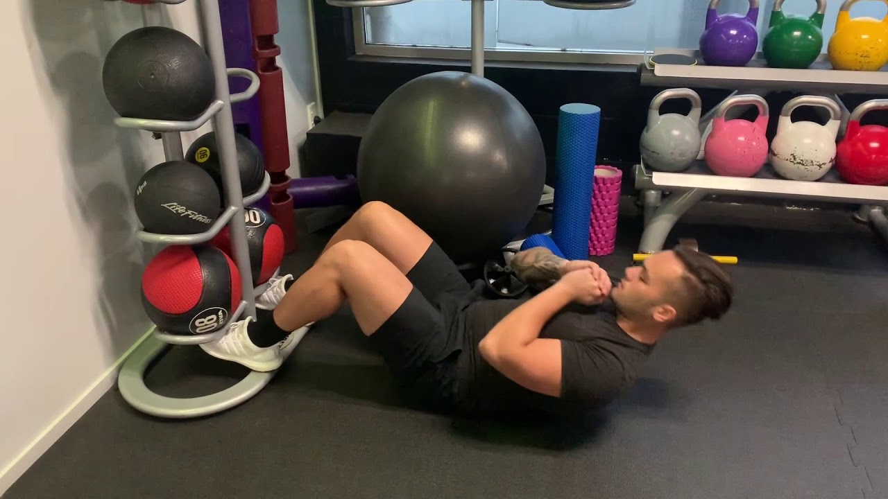 Sit Ups With Feet Tucked Demonstration - YouTube