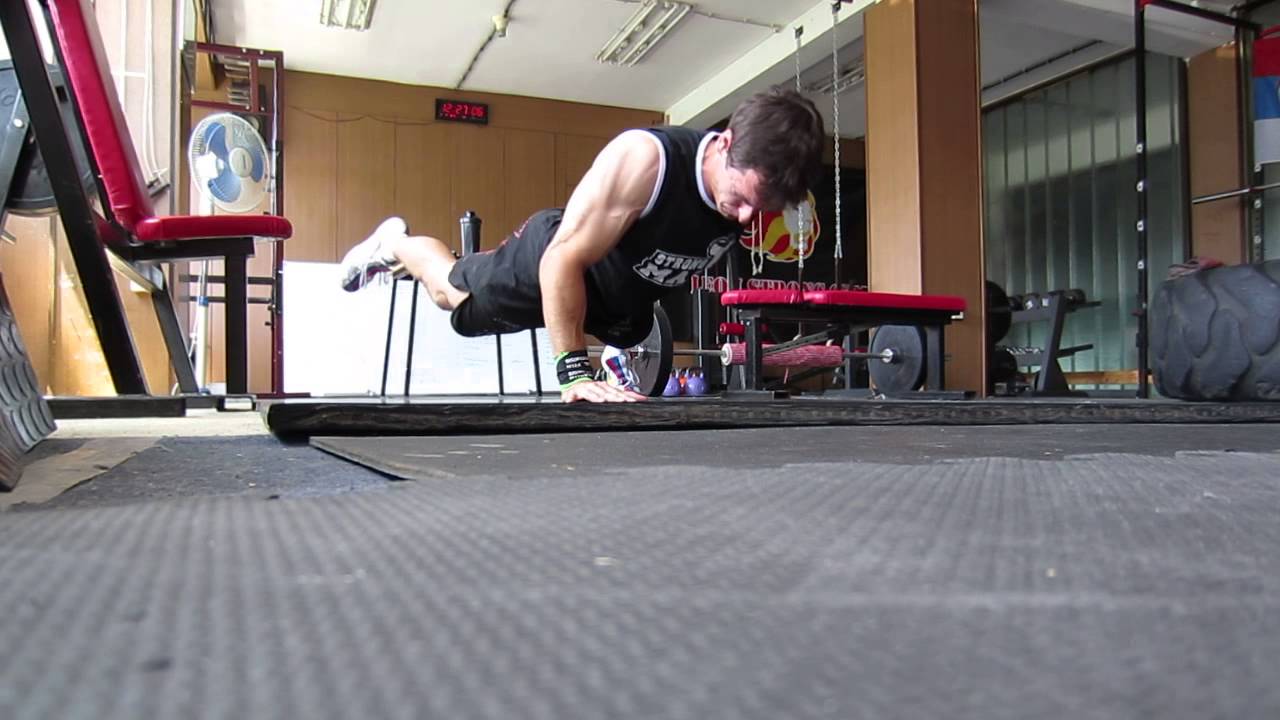 One arm one leg pushup Leon Strong Gym - YouTube