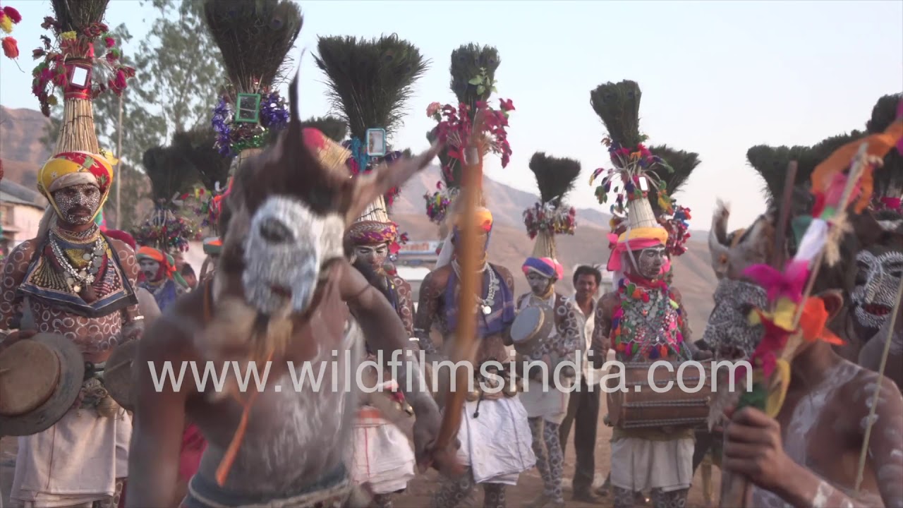Tribal men from Pawara community dance and play music during Uli ...