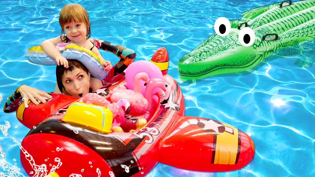 Kids play dolls & feeding baby toys at the swimming pool & Family fun ...