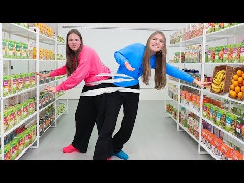 Amelia & Avelina get Stuck Together! Learning to Work as a Team.