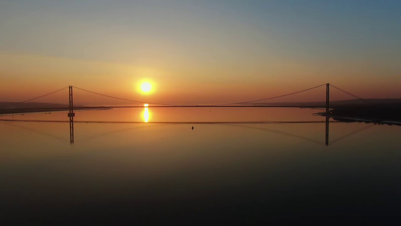 Sunset at the Humber Bridge, the water so calm it’s mirror like. - YouTube
