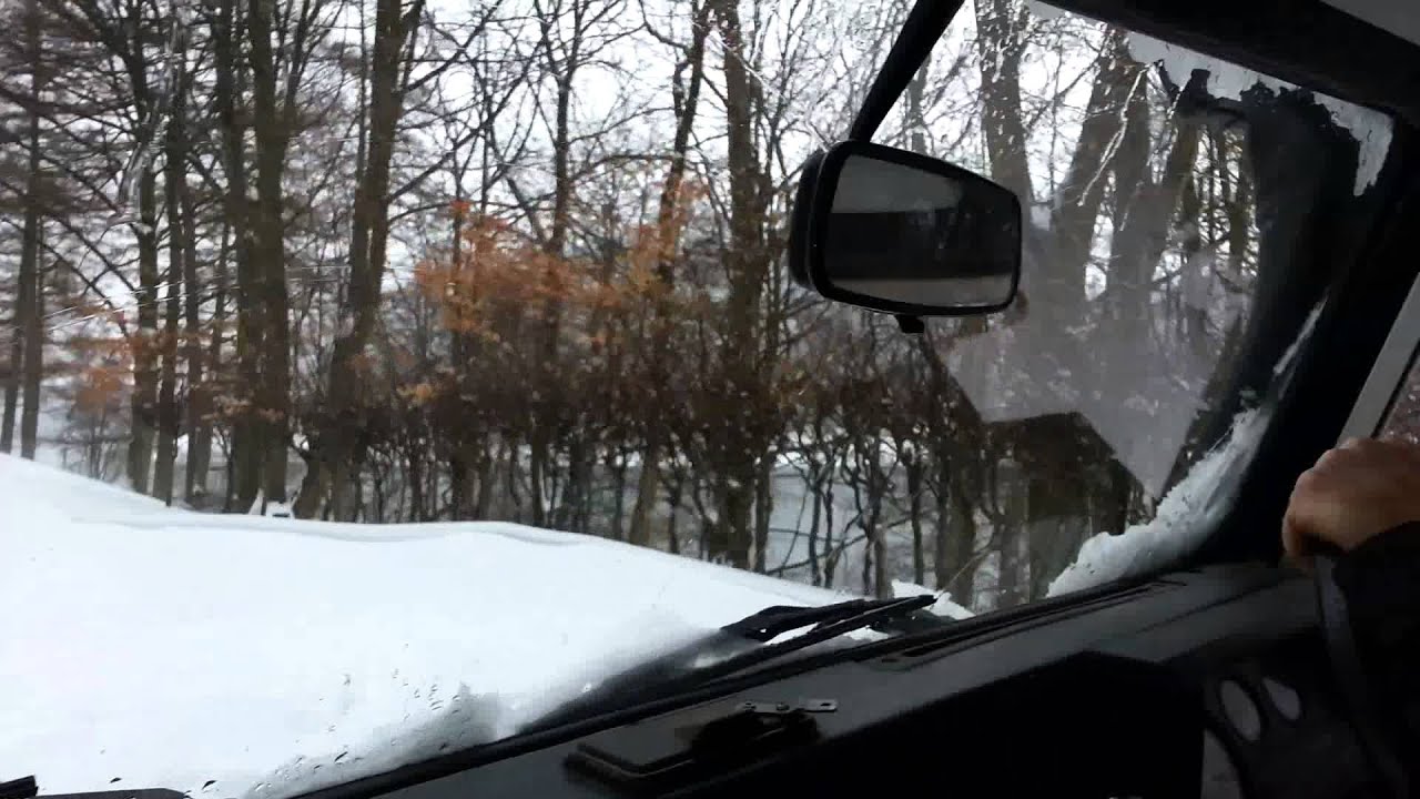 Land rover defender driving in snow - YouTube