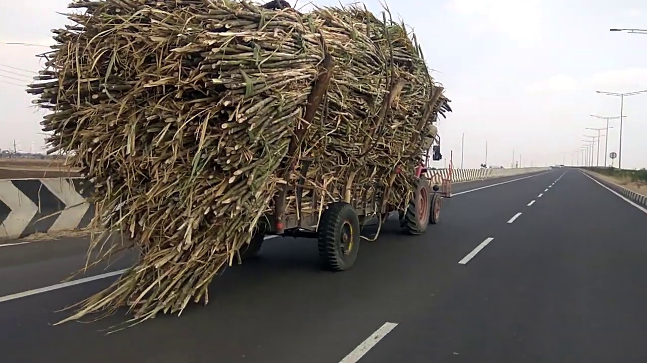 Overloaded Tractor On Highway - YouTube