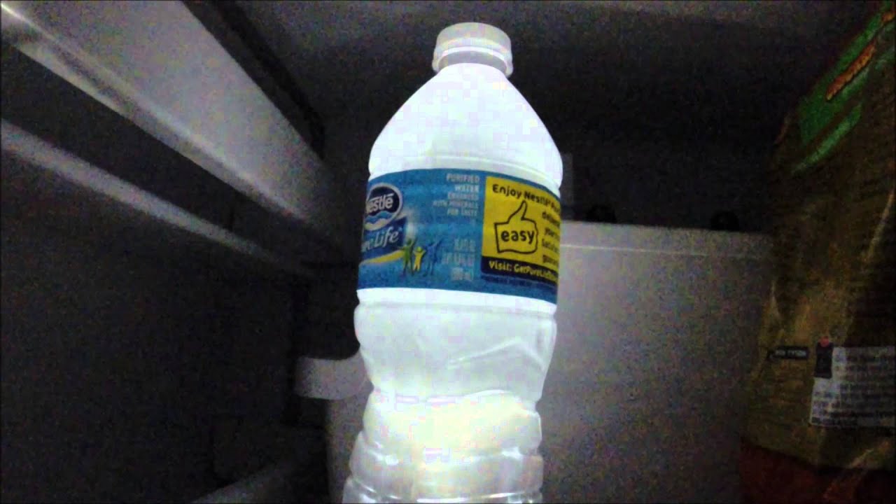 water bottle forming ice in real time - YouTube