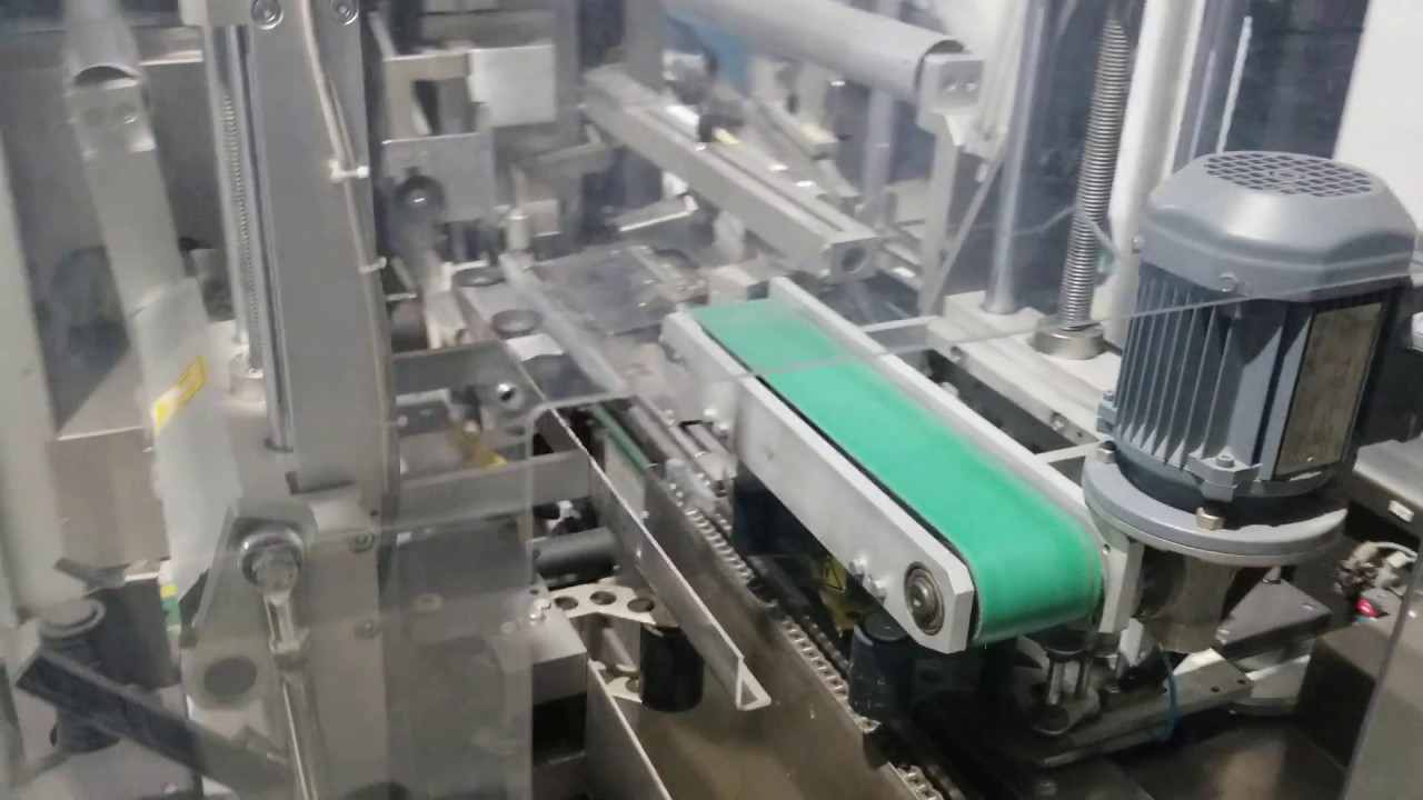 IMA BFB CP18 case packer with tape application - YouTube