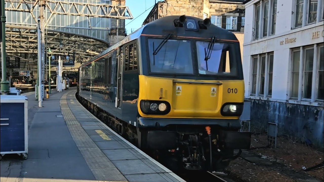 Caledonian Sleeper Class 92's departing Glasgow Central - YouTube