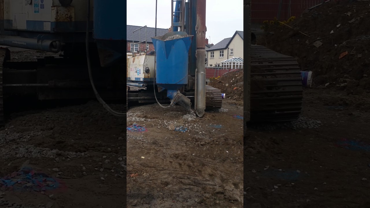 Vibro stone piling rig in operation - YouTube