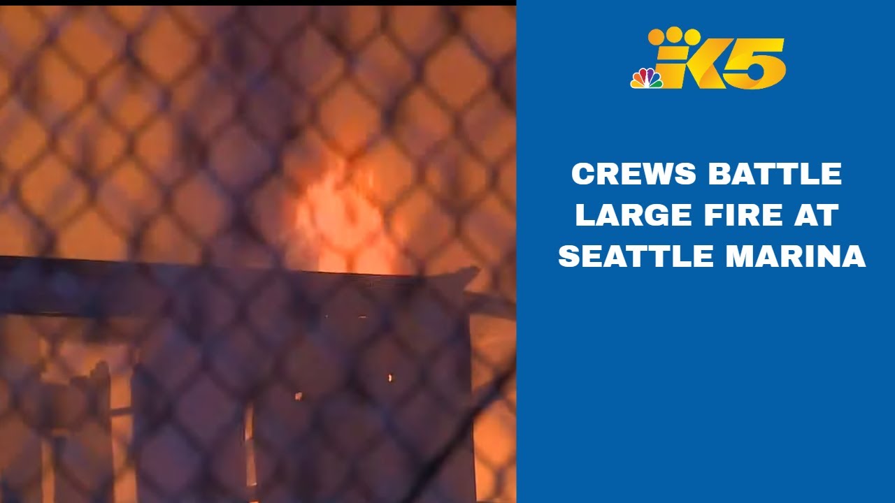Crews battle large fire at South Park Marina in Seattle - YouTube