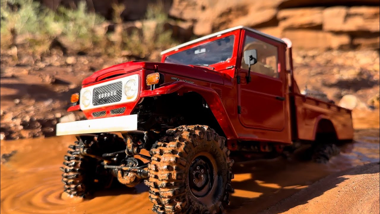 FMS Lifted FJ45 scale drive in mud and water. - YouTube