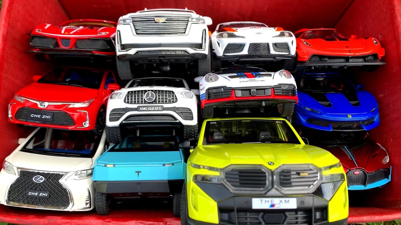 Box Full of Model Cars /BMW XM, Porsche 911, Toyota Supra, Bugatti Divo ...