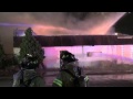 FIREFIGHTERS STOP SPREAD OF FULLY-INVOLVED COMMERCIAL BUILDING FIRE AT ...