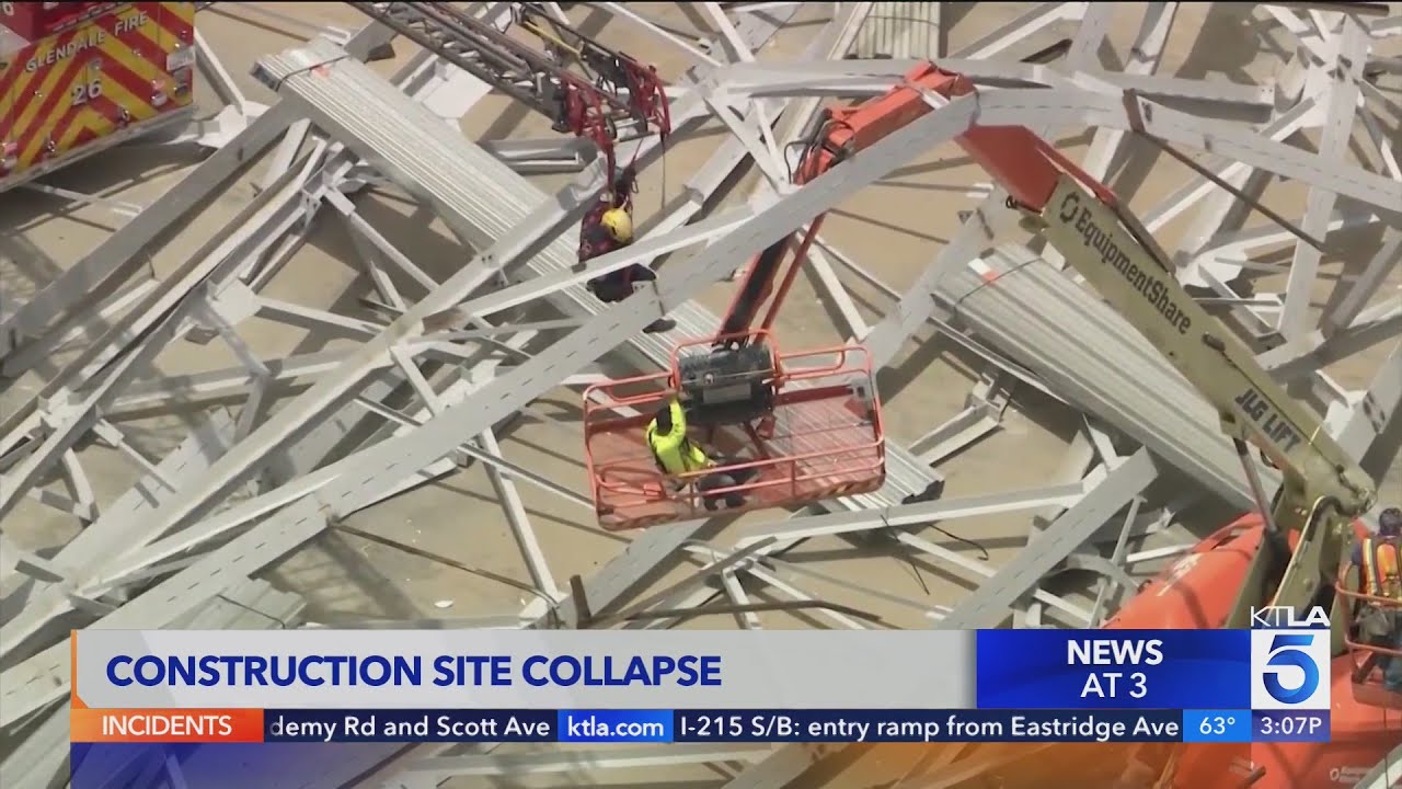 6 workers rescued after construction collapse in - YouTube