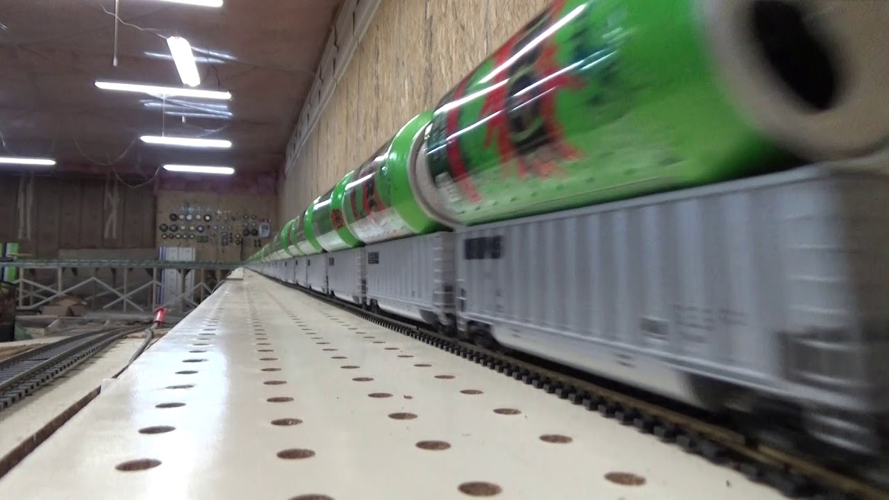 The fastest Silver Bullet train with empty 16 oz SURGE cans riding on ...