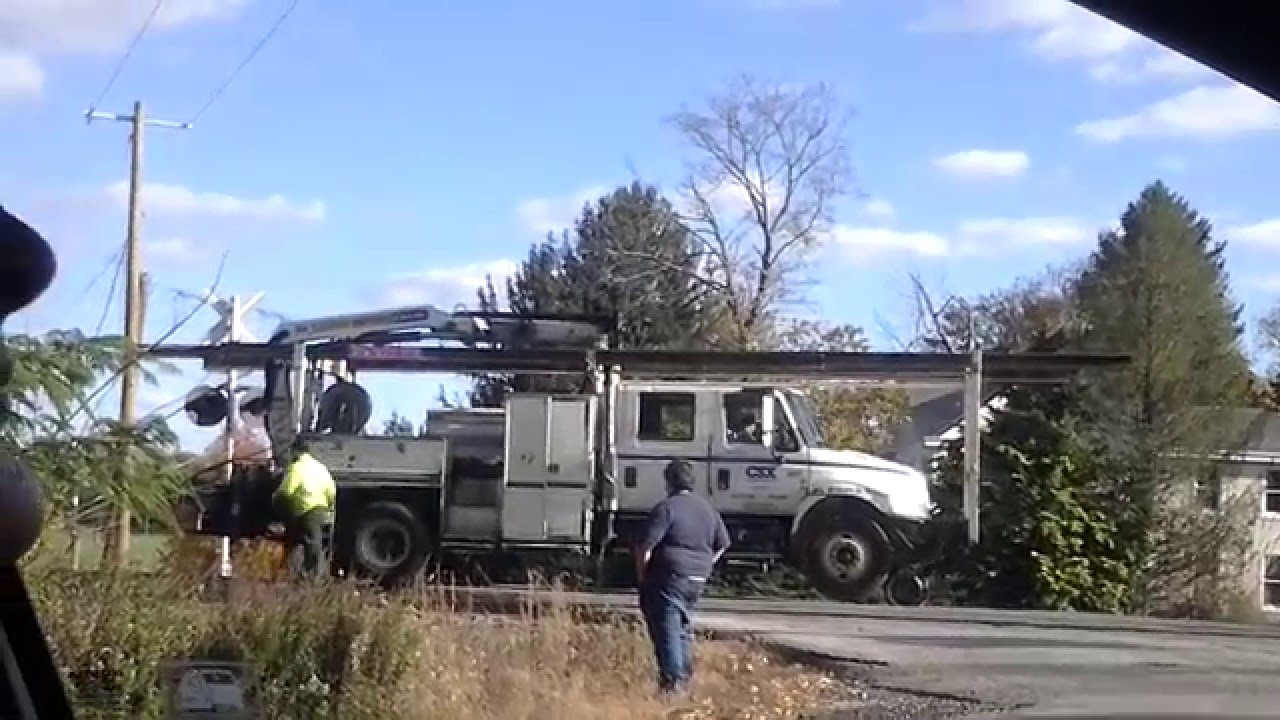 Three CSX Trucks Working on the Tracks - YouTube