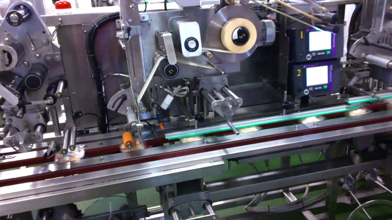 Sovereign Monarch 'C' Wrap labelling Machine - YouTube