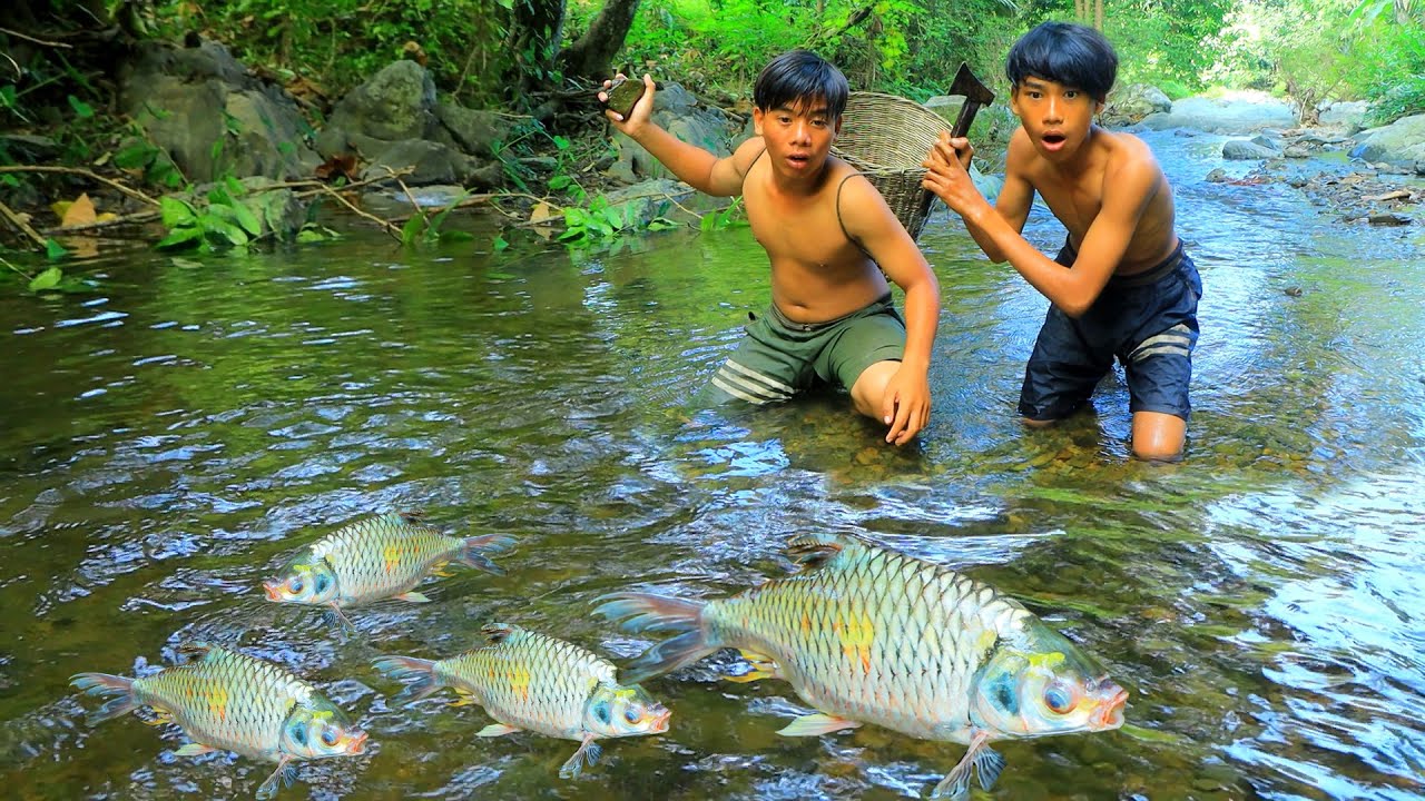 Primitive Technology - Two boy find fish and cook | Eat salad with ...
