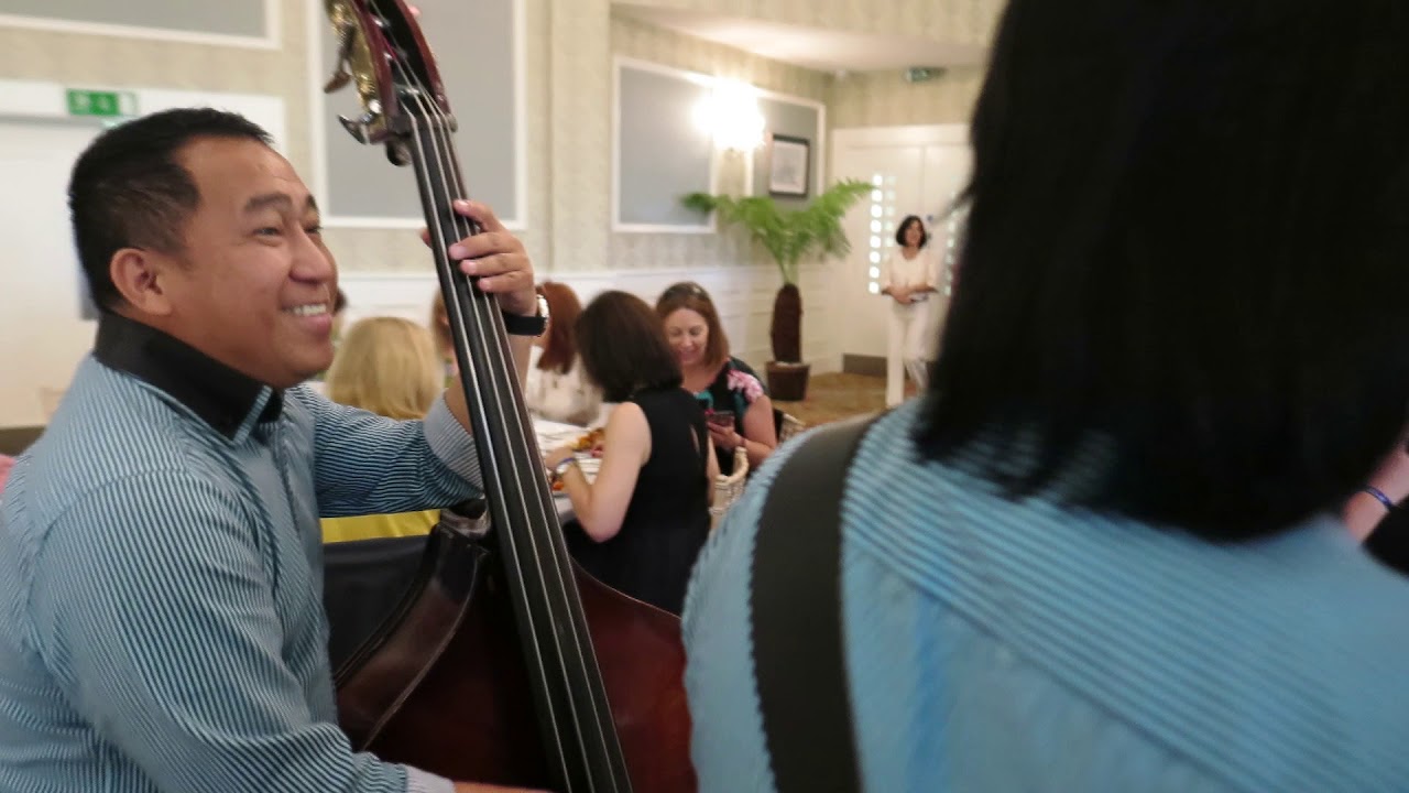 Phillipino group Manila Strings singing Jimmy McCarthy's Ride On - YouTube