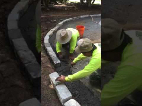 Mortar setting granite cobblestone - YouTube