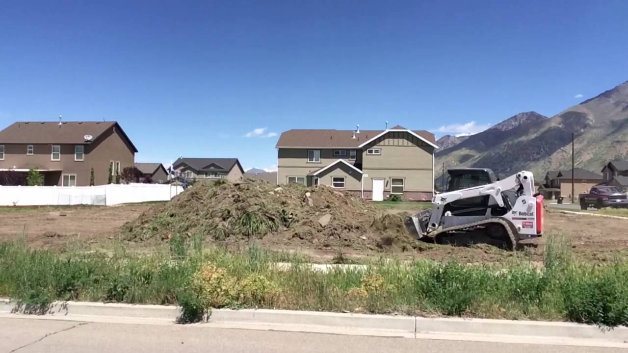 How to Build a House - Grading out a lot - YouTube