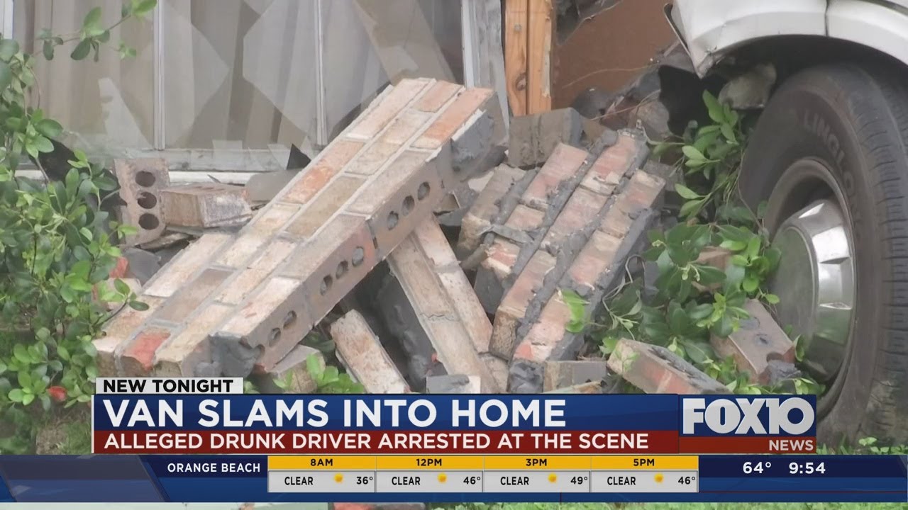 Van crashes into a home in Toulminville - YouTube