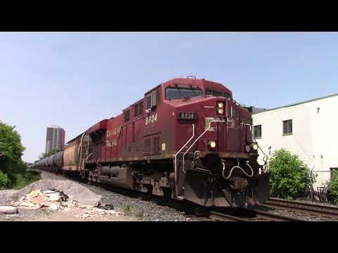 (CPKC) CP 528 with KCS 4190 rear DPU passing Bartlett - YouTube