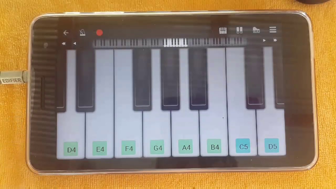 Learn to play the piano on the phone , រៀនលេងព្យានូ បទ សុំទោស - YouTube