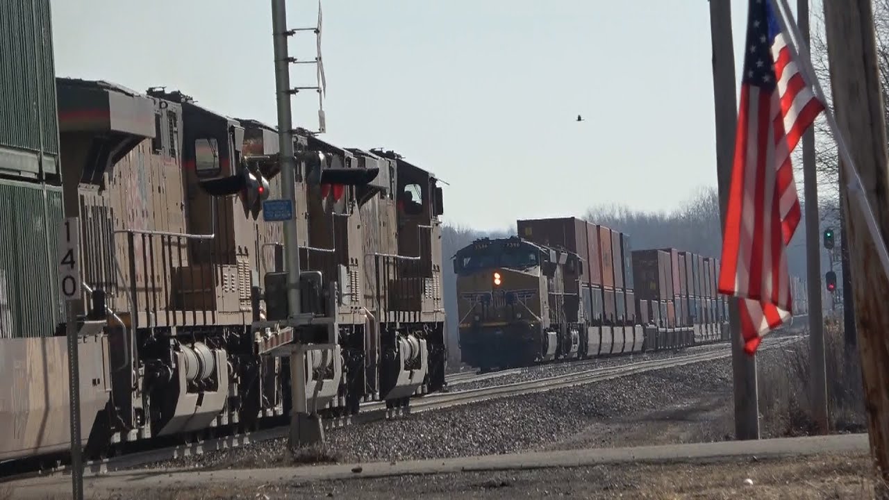 UP Priority train meets stack train, drone footage of a mixed freight ...