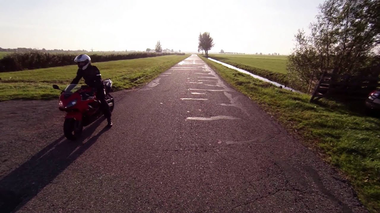 Quadcopter motorcycle flyby - YouTube