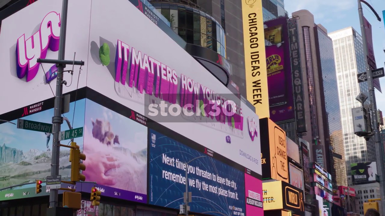 Wide Shot Of Neon Signs In Times Square New York City, USA - YouTube