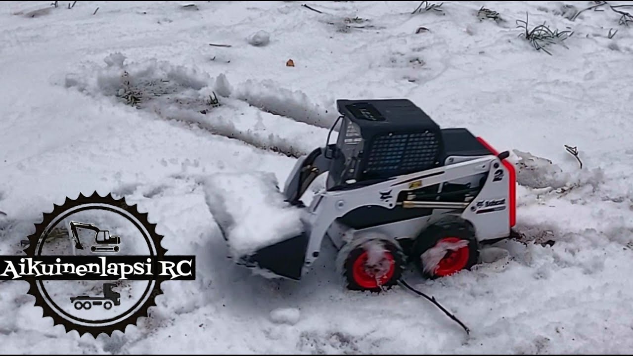 RC Bobcat snow plowing. 1/14 - YouTube