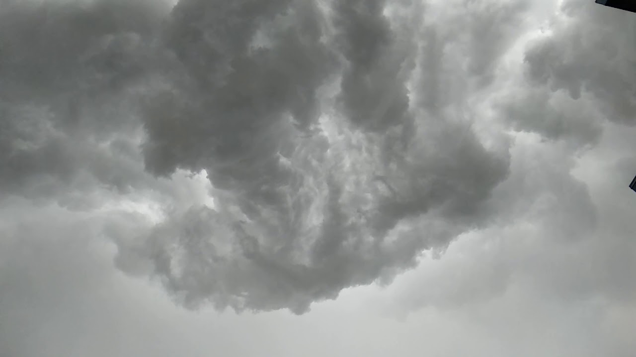 Nature's ferocious but beautiful face..boiling sky laden with dark ...