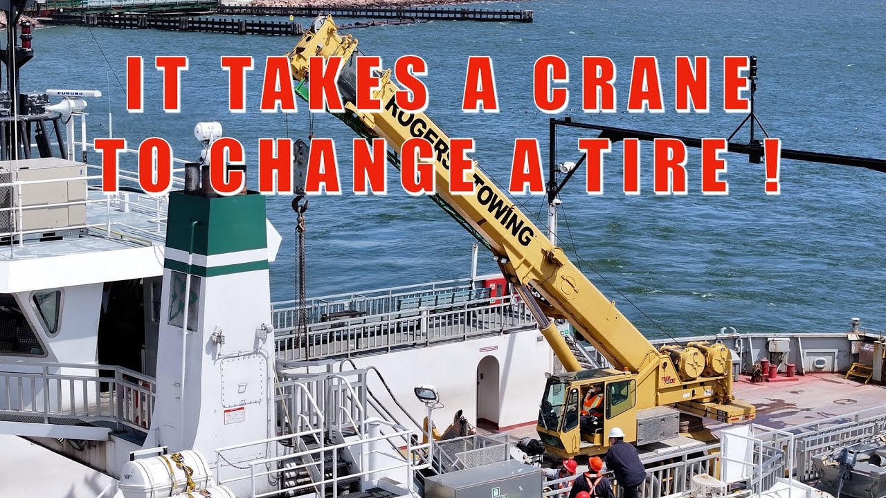 It takes a crane to change a tire ..! 4K - YouTube