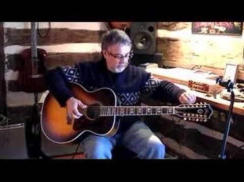 Danny Flowers on the Guild F-412 - YouTube