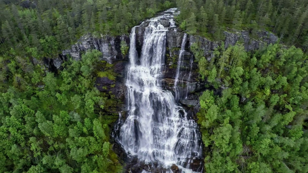 aerial footage from tvindefossen waterfall from the birds eye view ...