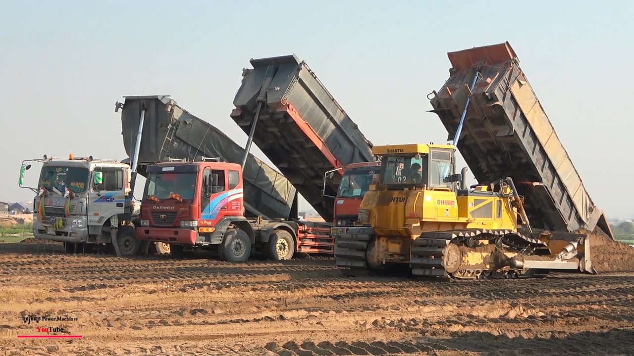 Safety Operator Overload Dumper Truck Spreading Sand - YouTube