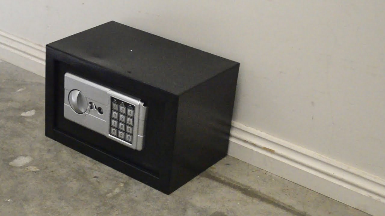 Breaking into the Titanium Security Iron Jail Lock Up Prison Cell Safe ...