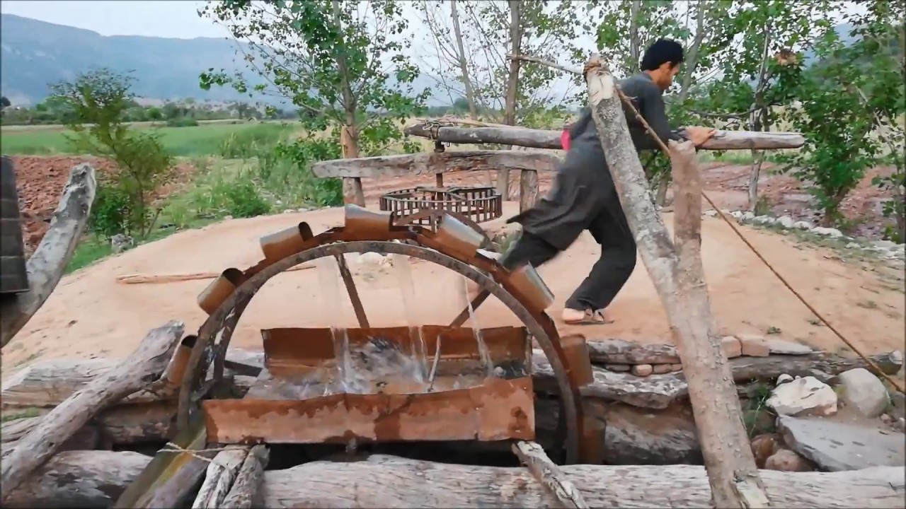 primitive technology | Farming Irrigation by Water Well - YouTube