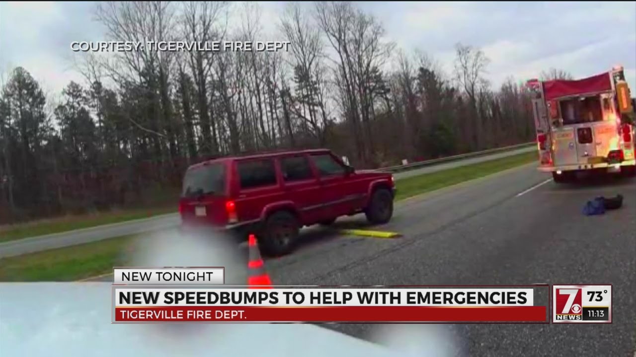 Speed bumps slow traffic for roadside emergency crews - YouTube