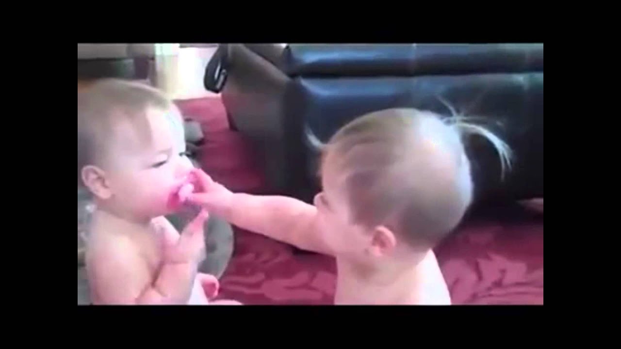 Adorable twins fight over pacifier! - YouTube