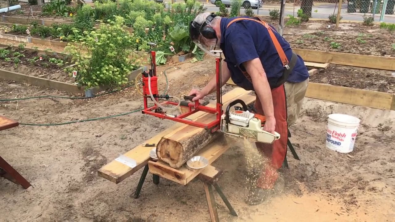 Chainsaw slow-mo milling small teak log. - YouTube
