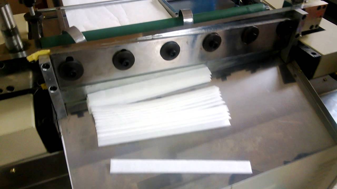 non-woven piece cutting machine - YouTube