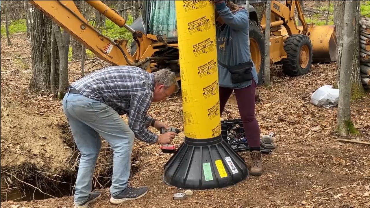 Digging the Footer with a Backhoe and Moving the Second Beam - YouTube