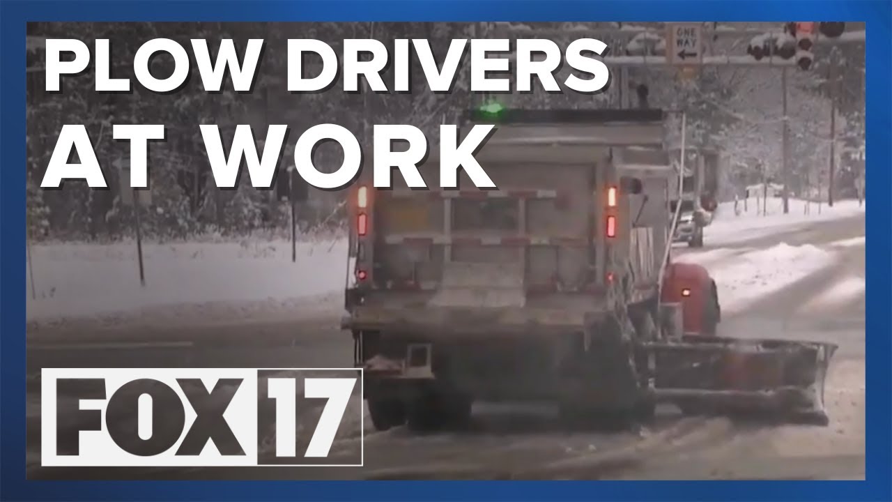 Plow drivers working to clear snow from West Michigan roads - YouTube