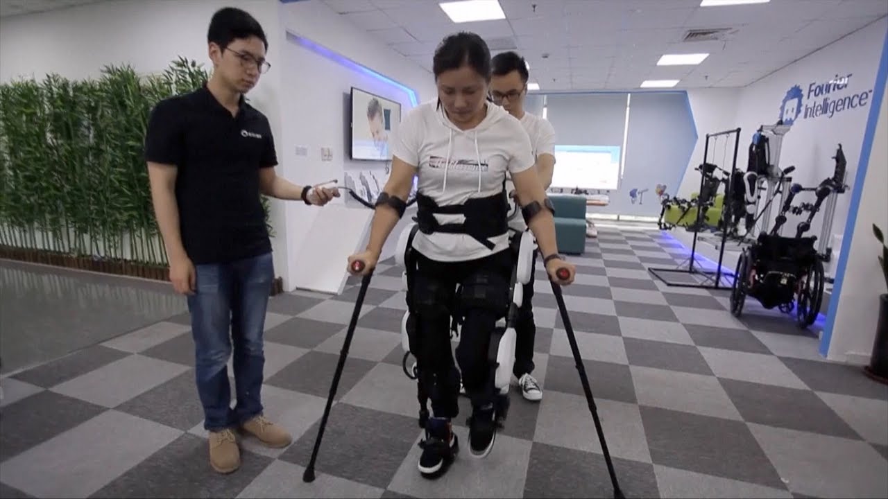Chinese startup develops robots to help patients walk again - YouTube