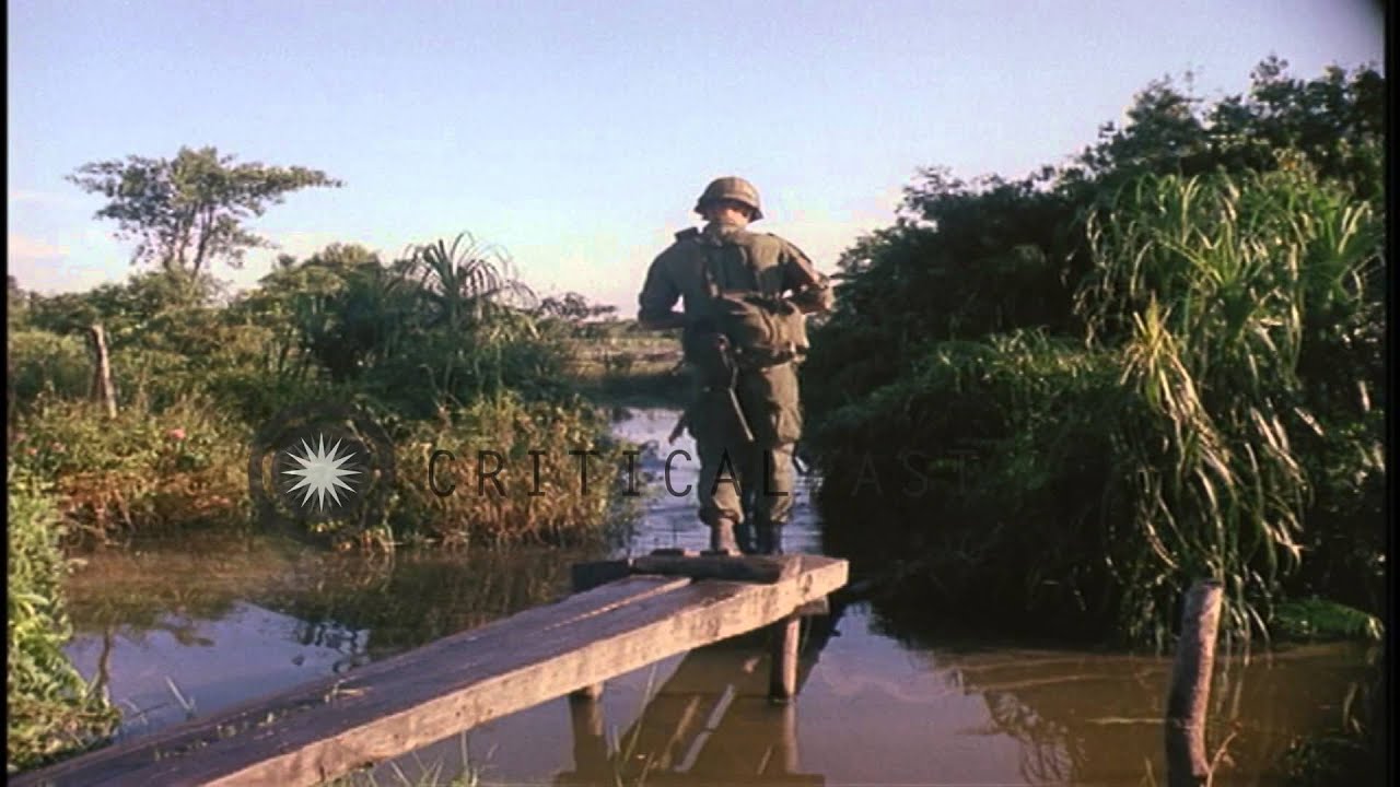 Soldiers walk through the fields and villages during Operation Hump of ...